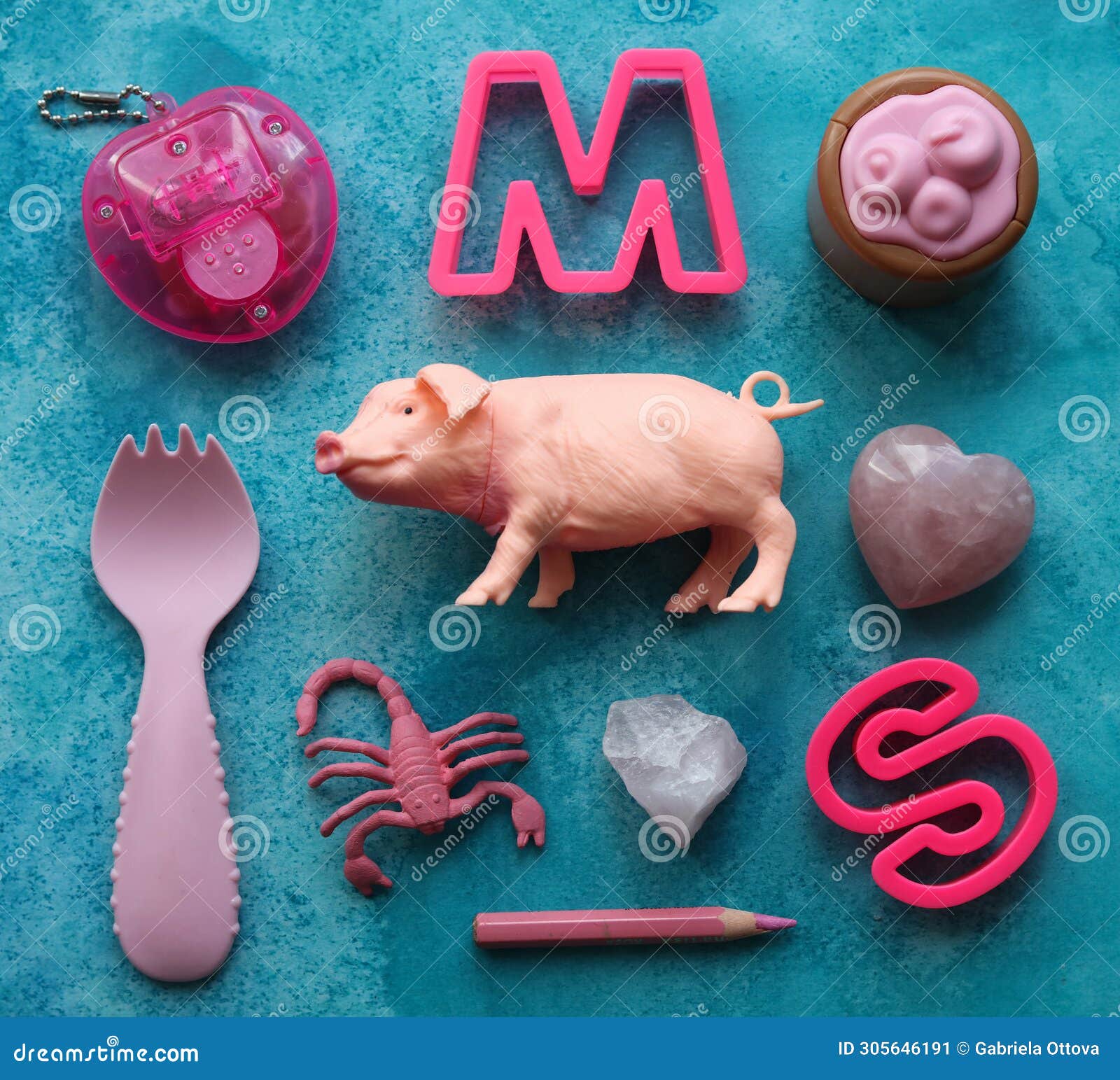 A Blue Background with a Variety of Pink Toys and Items Stock Image ...