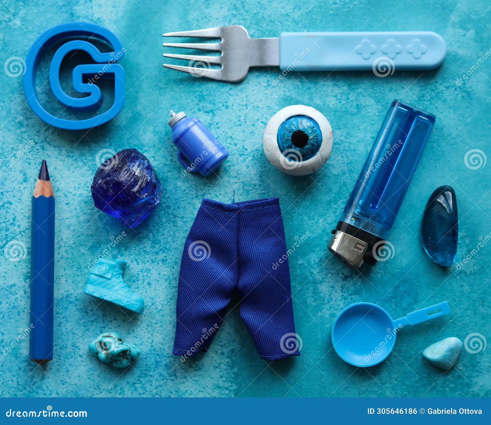 A Blue Background with a Variety of Blue Toys and Items Stock Photo ...