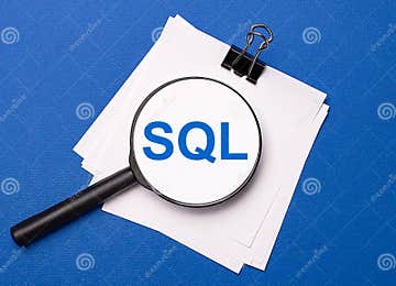 On a Blue Background, White Sheets Under a Black Paper Clip and on Them ...