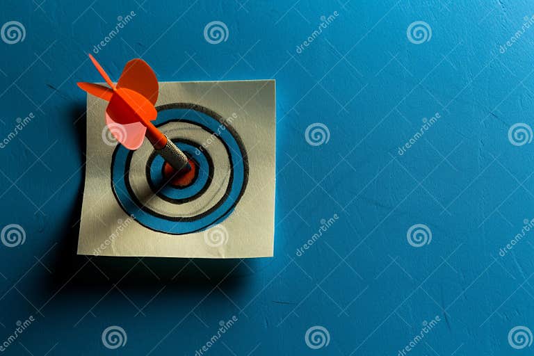 Blue Background with a White Sticky Note Featuring an Image of a Target ...