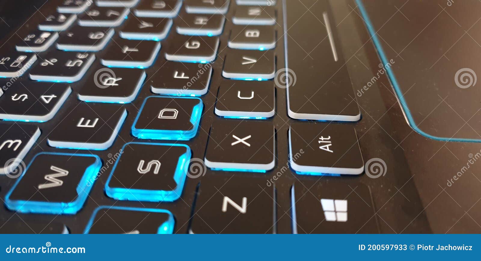 Blue backlit keyboard stock image. Image of gadget, laptop - 200597933