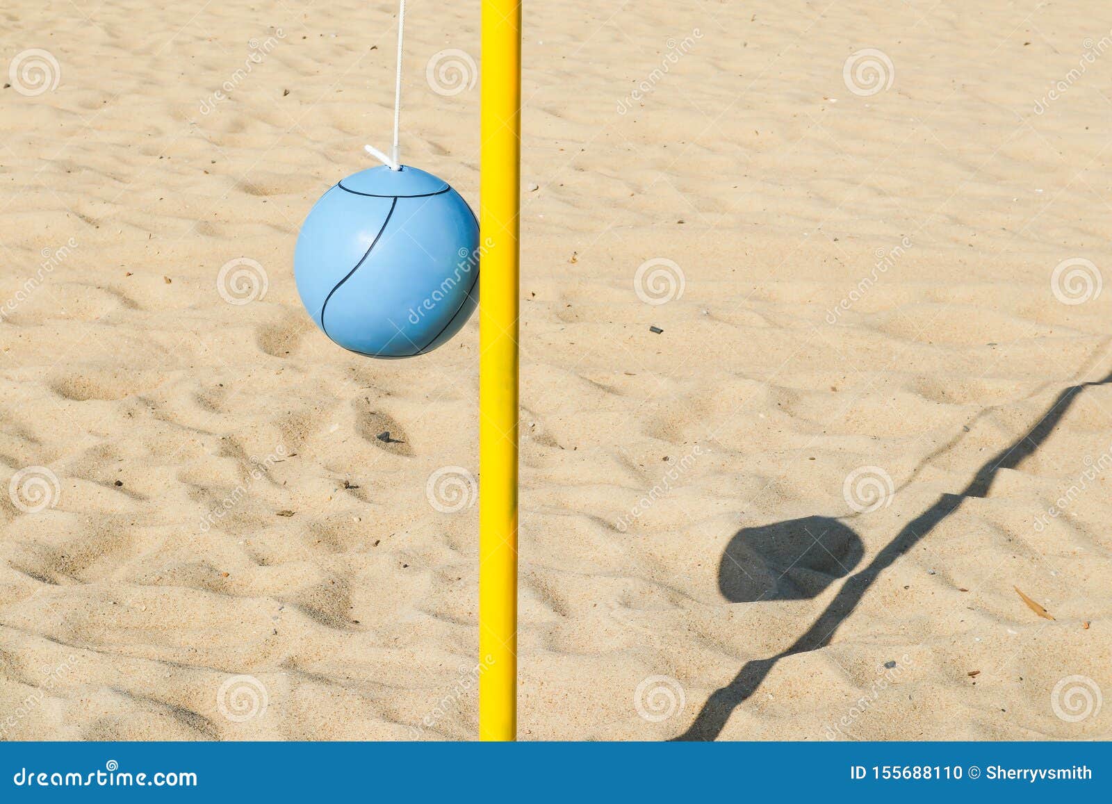 Blue Tetherball and Yellow Pole Stock Photo - Image of fitness, game ...