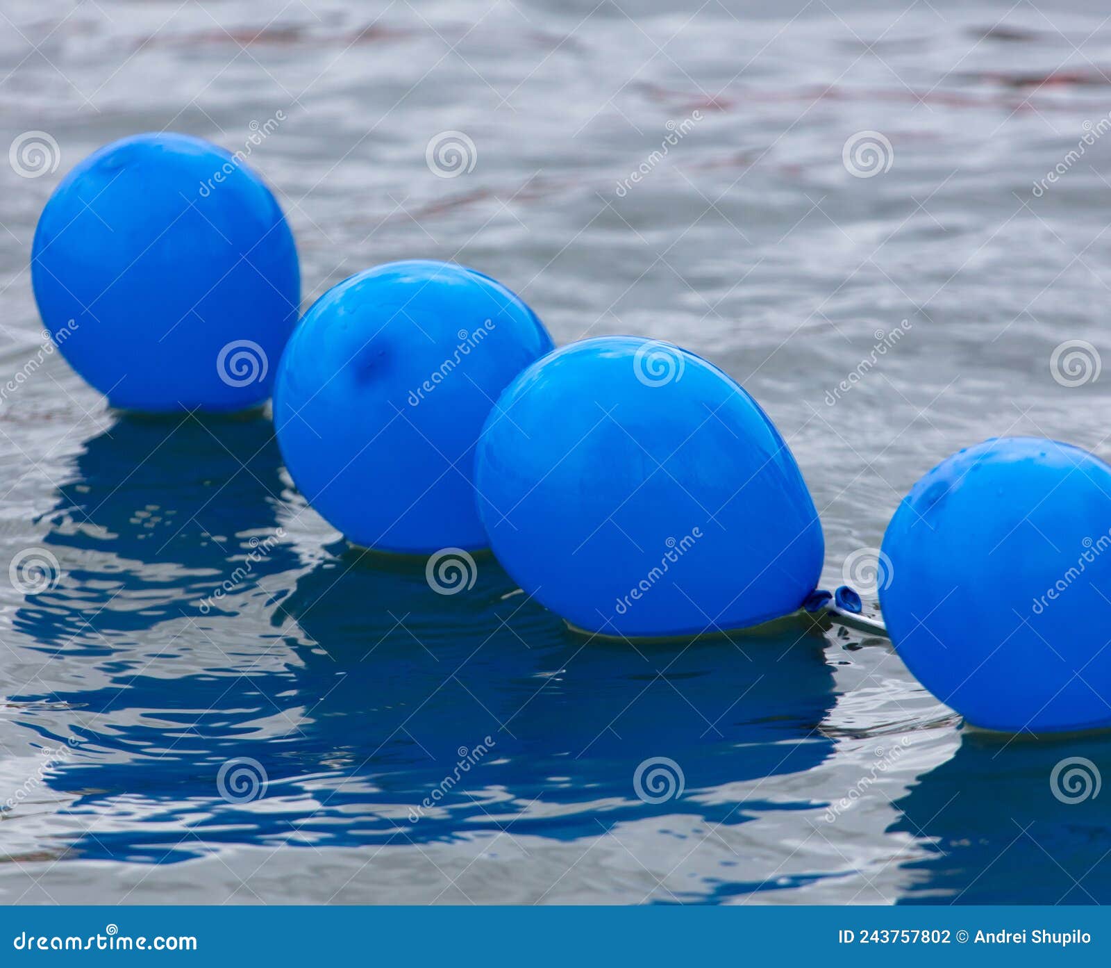 Blue Balls Float on the Water Stock Photo - Image of nature, beach ...