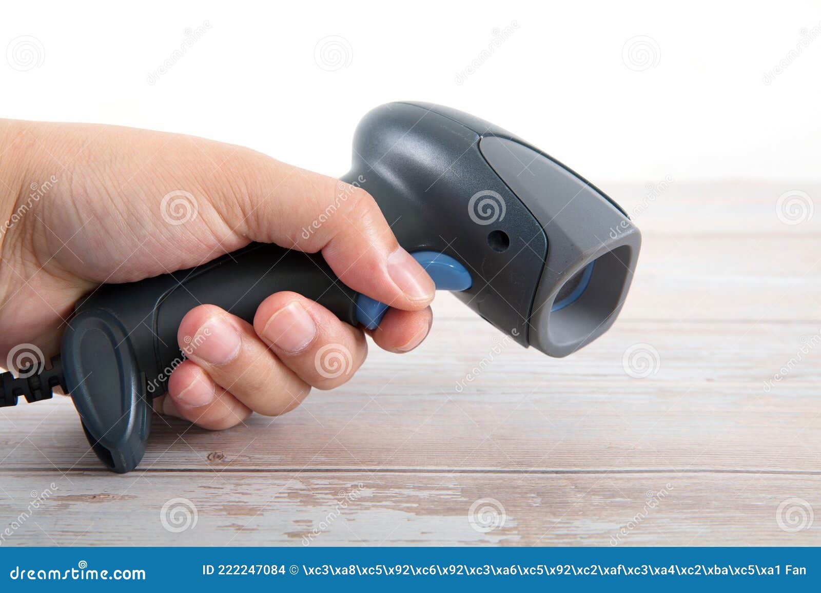 A Blue Barcode Scanner Cash Register Tool on the Table Stock Photo ...