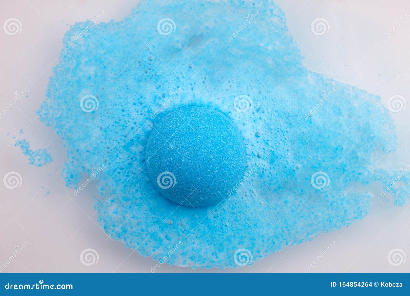 Blue Bath Bomb Foaming in Water Stock Photo - Image of beauty ...