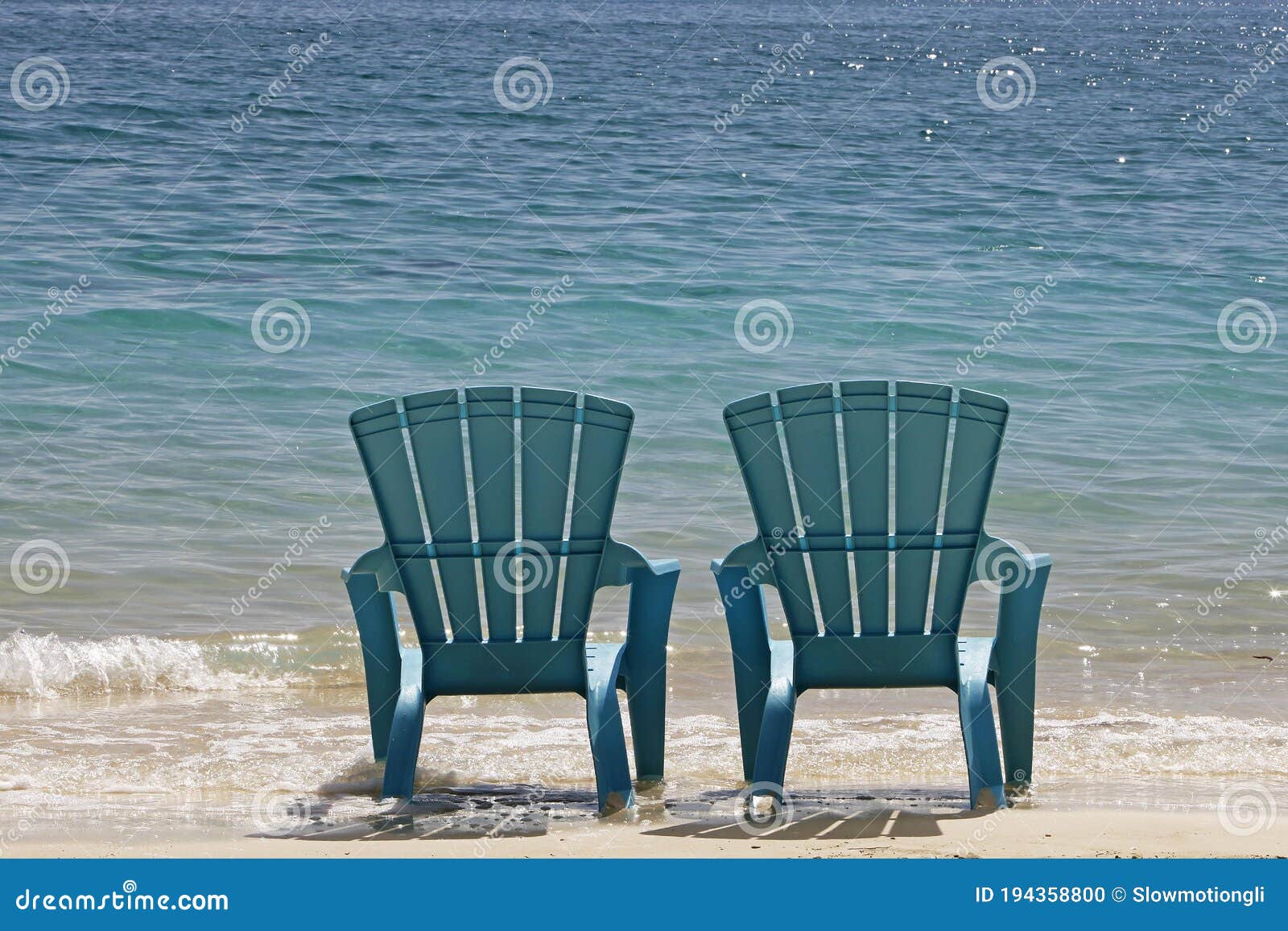 Blue Beach Chairs, Cat Island in Bahamas Stock Photo - Image of beach ...
