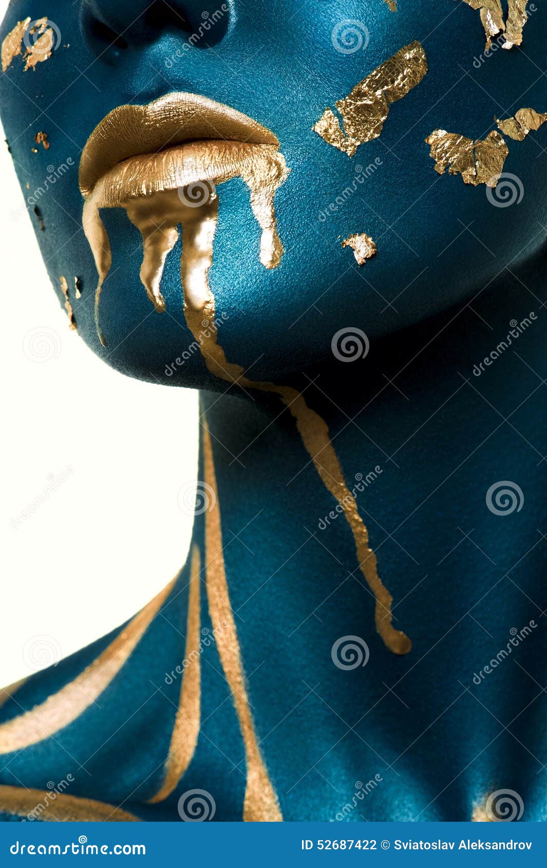 Blue Beauty Model with Liquid Gold on Face. Stock Photo - Image of ...