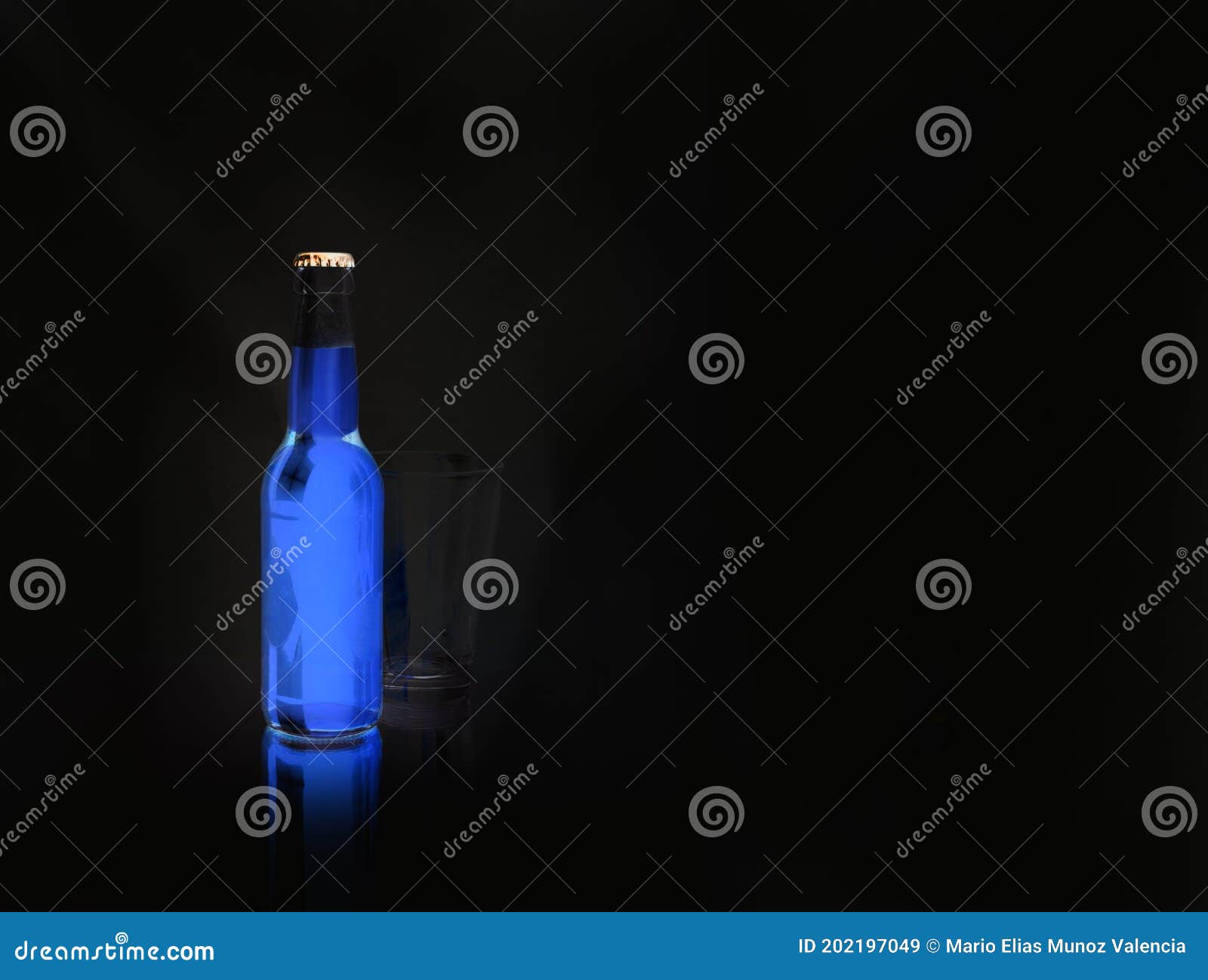 A Blue Beer Bottle Isolated on Black Background Stock Image - Image of ...