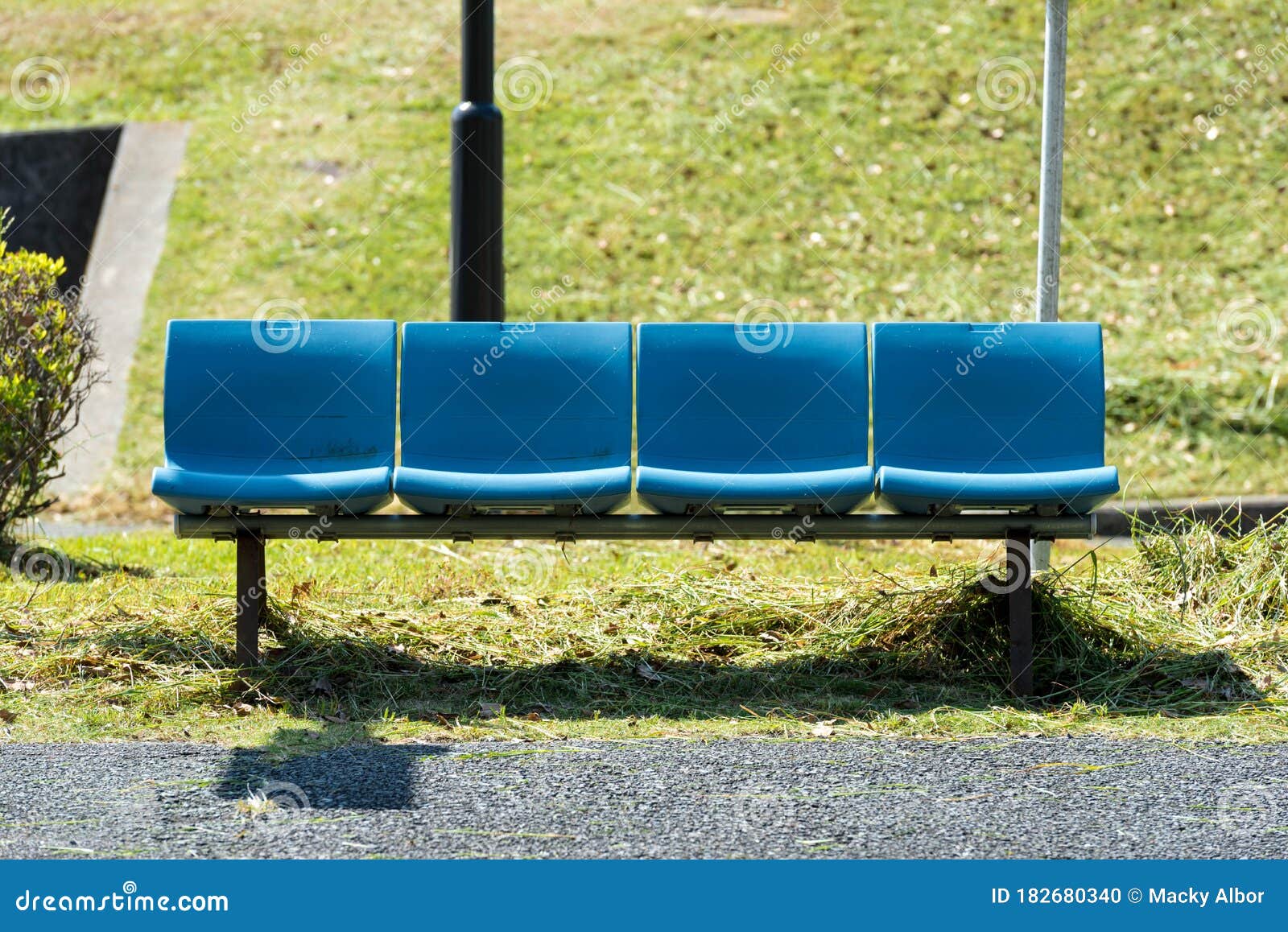 Blue Bench at the Bus Stop. Stock Photo - Image of empty, stops: 182680340