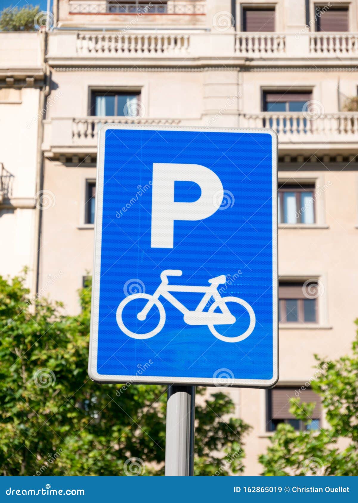 Blue Bicycle Signs stock image. Image of clouds, blue - 162865019