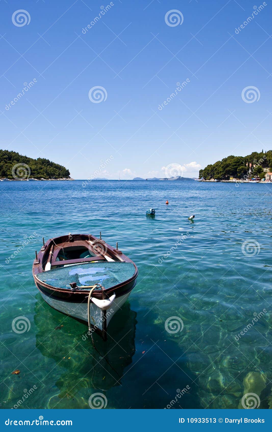 Blue Boat on Blue Water stock image. Image of fishing - 10933513