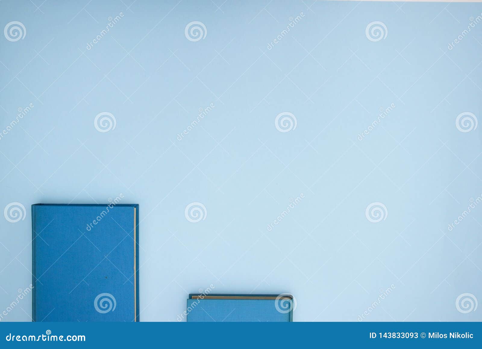Blue Books on Blue Background Stock Image - Image of phone, black ...