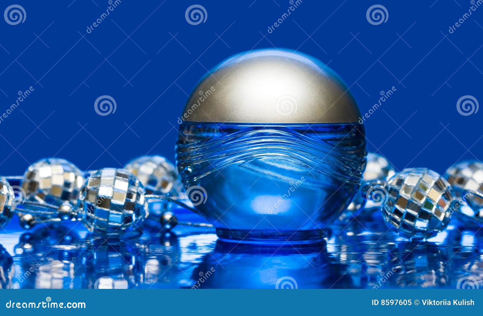 Blue bottle of perfume stock image. Image of female, aqua - 8597605