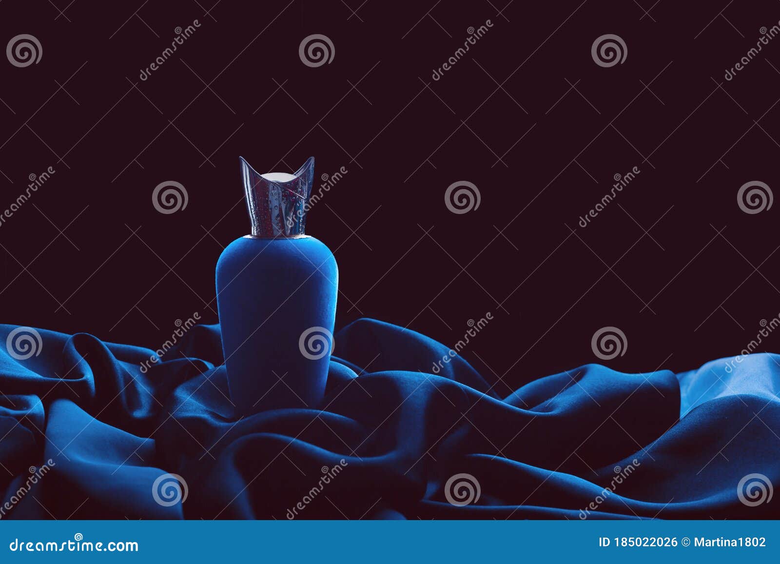 Bottle of Perfume on a Blue Background Stock Photo - Image of smell ...