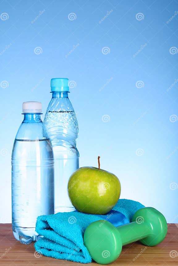 Blue Bottle of Water and Sport Stuff Stock Photo - Image of close ...