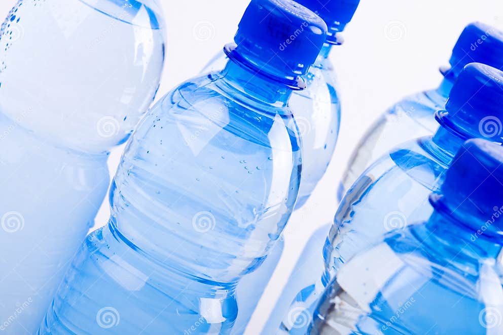 Blue bottles of water stock image. Image of healthy, nutritious - 99173615
