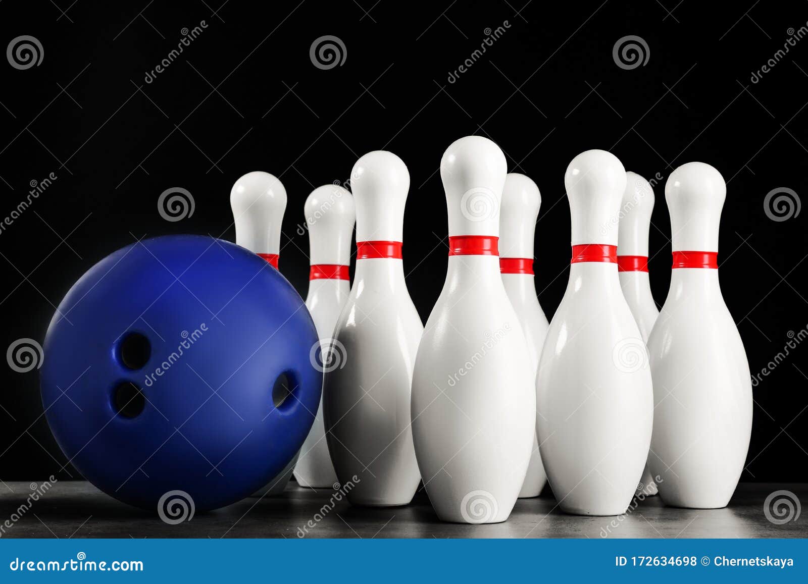 Blue Bowling Ball and Pins on Stone Table Stock Photo - Image of relax ...