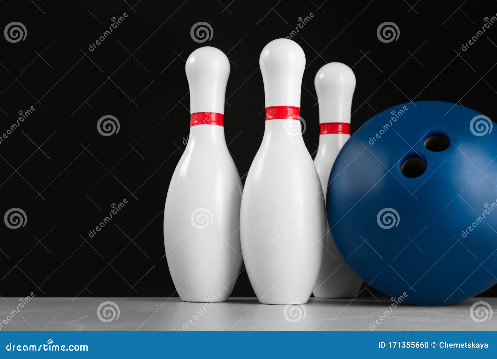 Blue Bowling Ball and Pins on Grey Marble Table Stock Photo - Image of ...