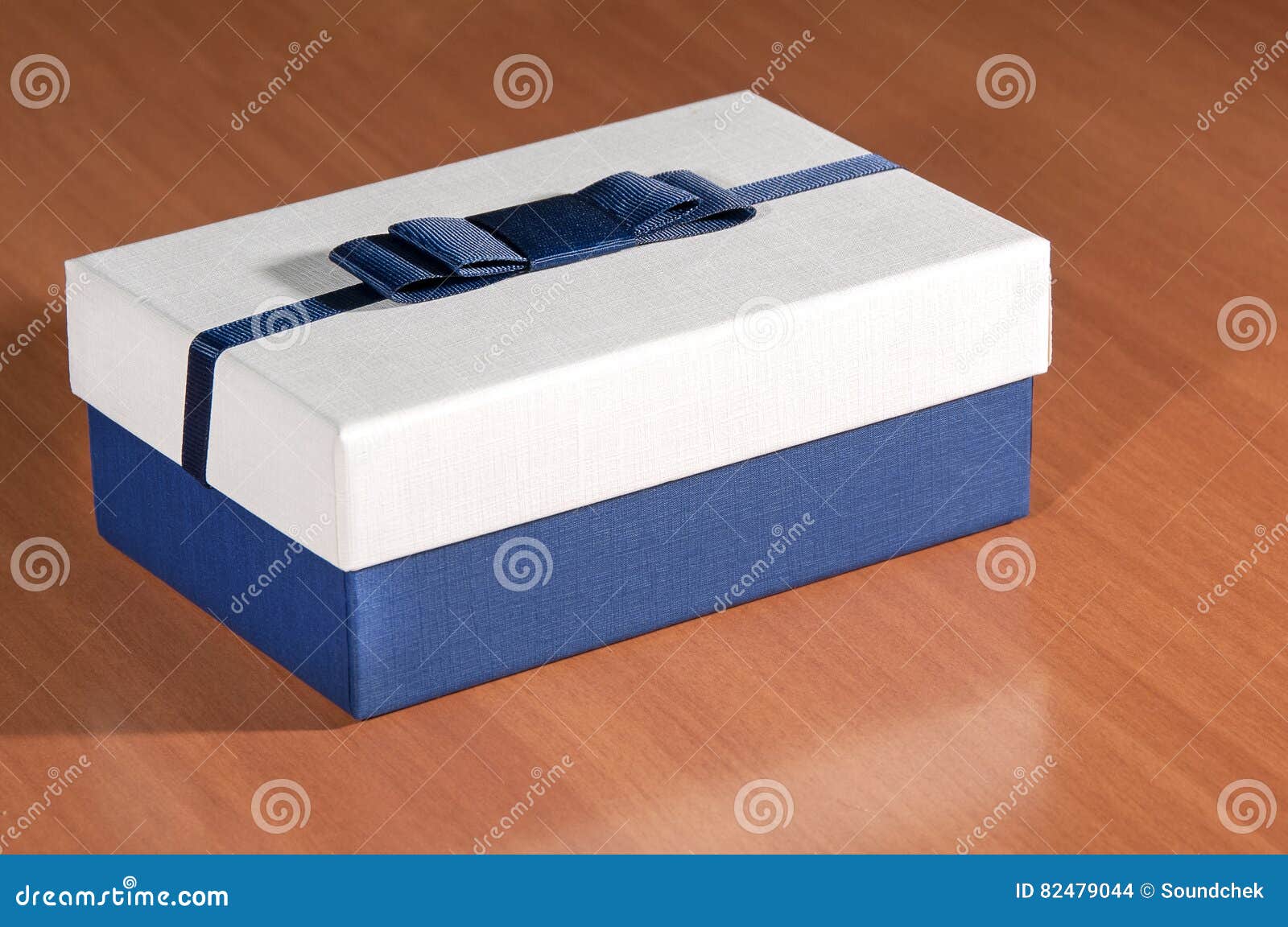 Blue box on a table stock photo. Image of gift, table - 82479044