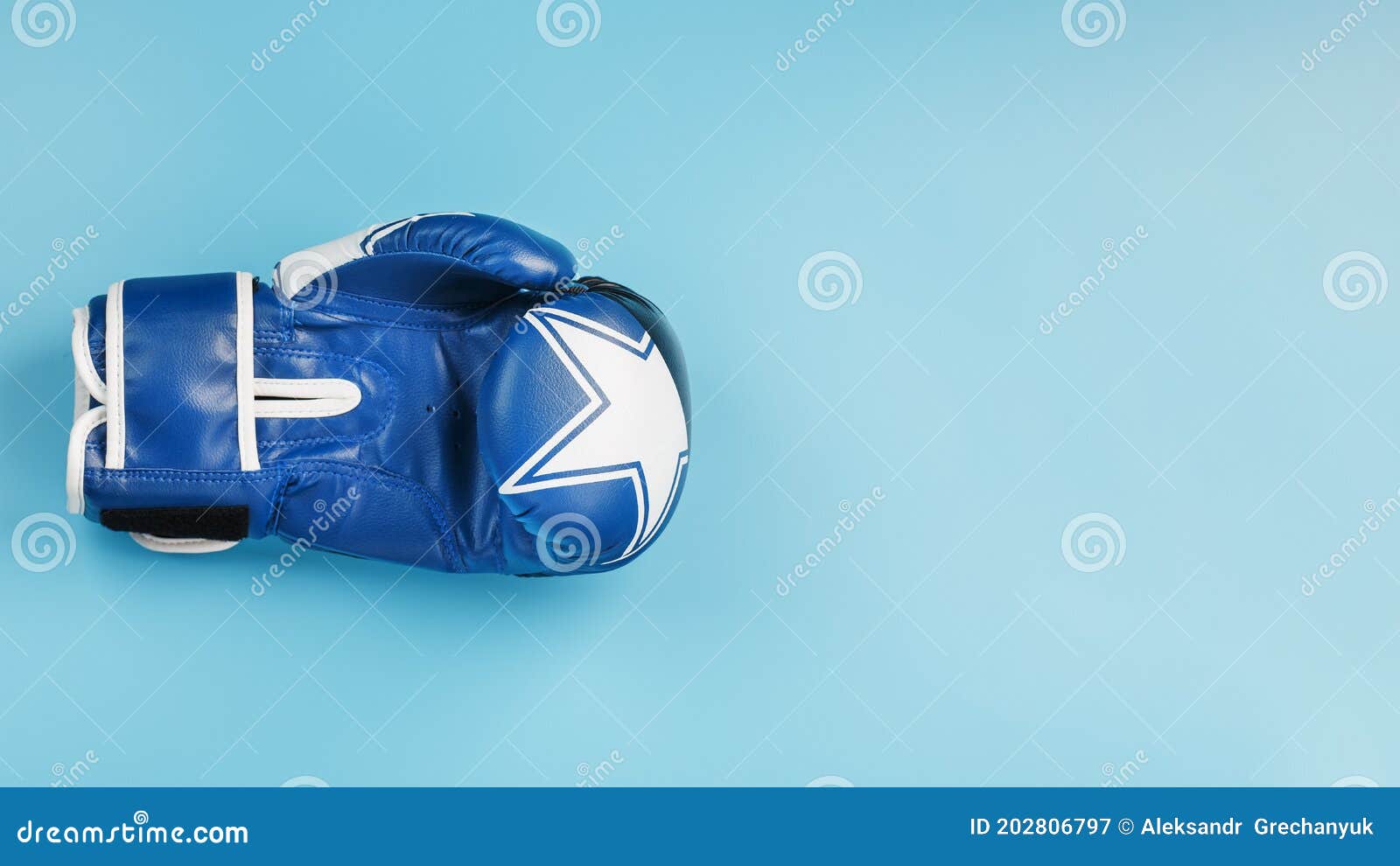 Blue Boxing Glove on a Blue Background, Free Space Stock Image - Image ...