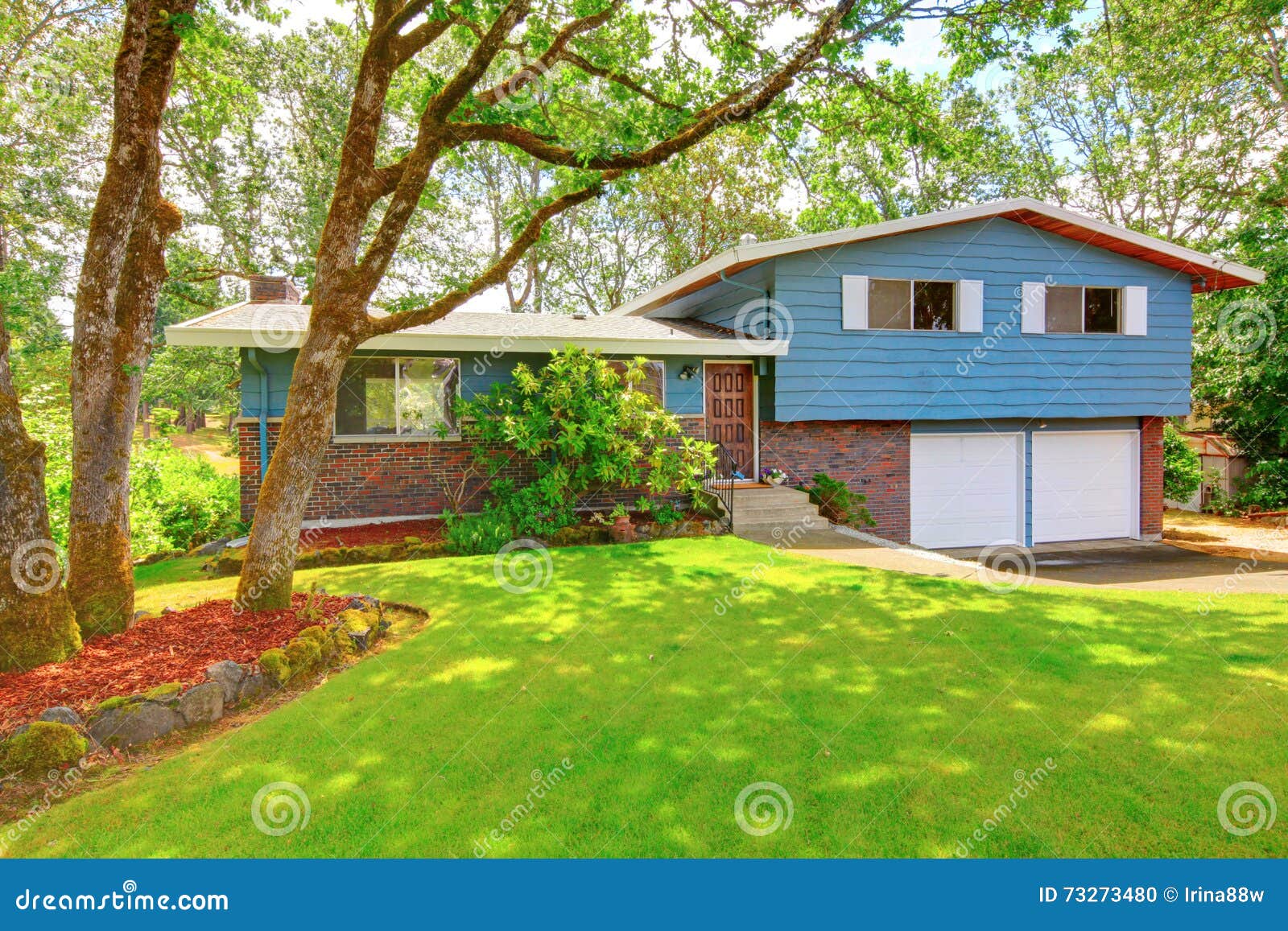 American Rambler House Exterior. View Of Walkway With Flower Bed. Stock ...