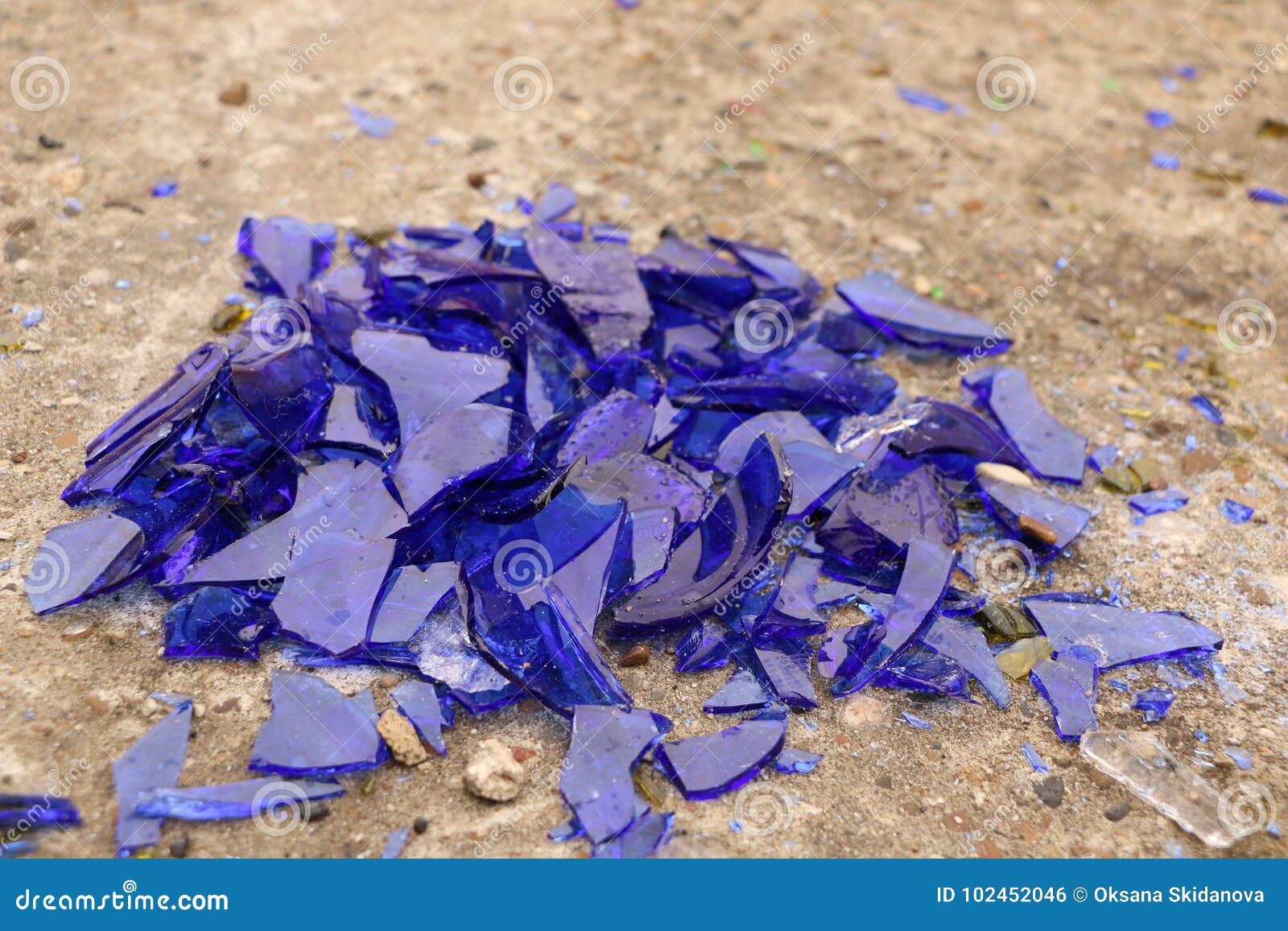 Blue Broken Glass on a Concrete Surface - Texture for a Background ...