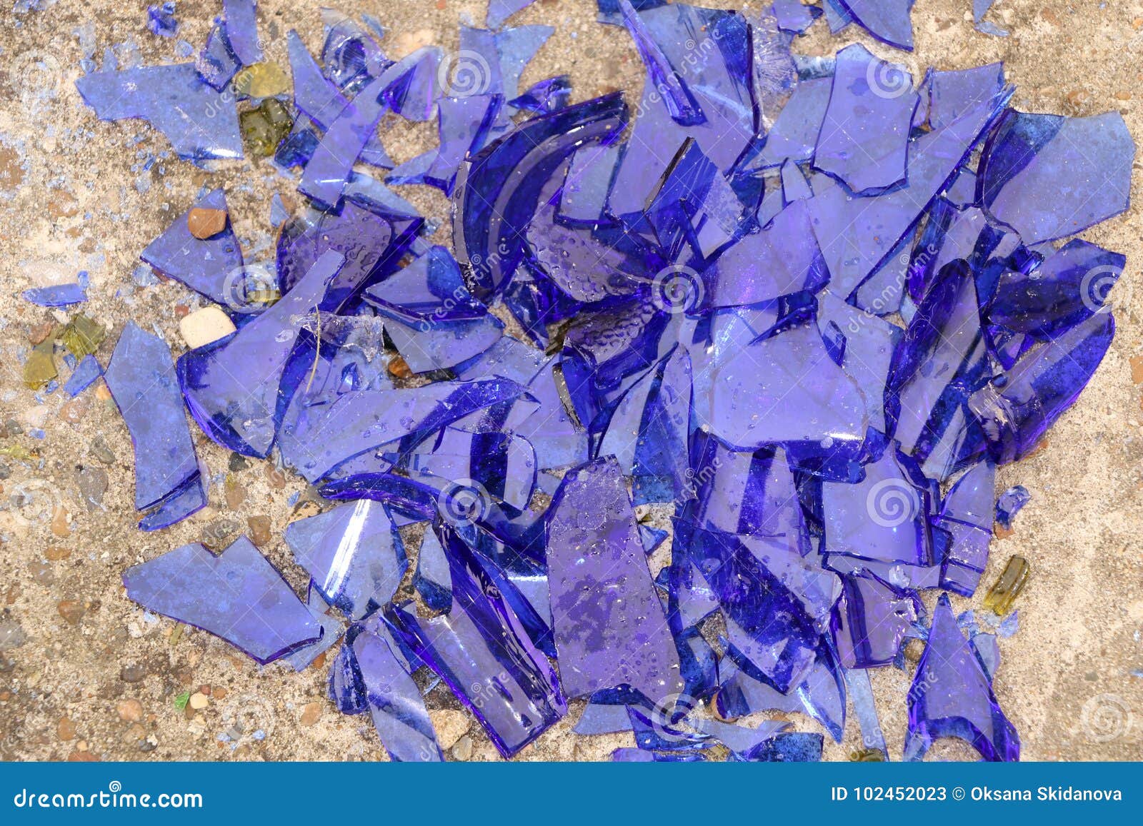 Blue Broken Glass on a Concrete Surface - Texture for a Background ...