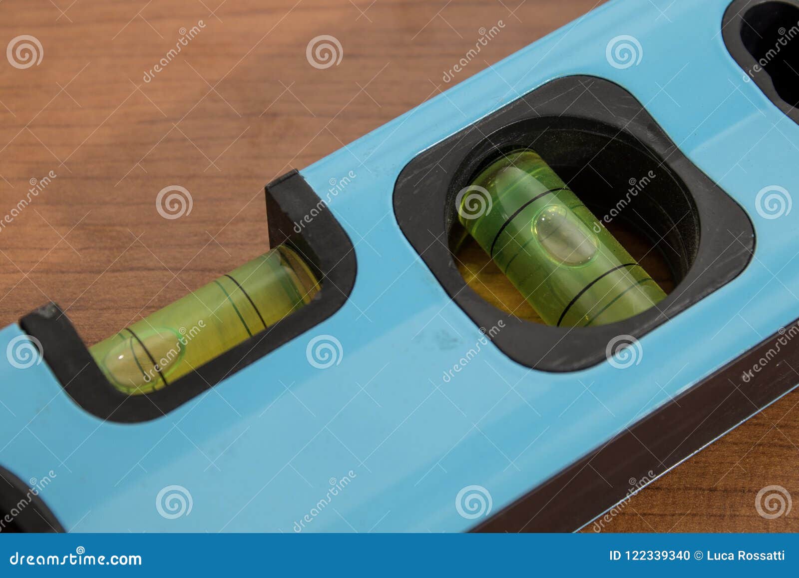 Blue Bubble Level on a Wood Table Stock Photo - Image of spirit ...