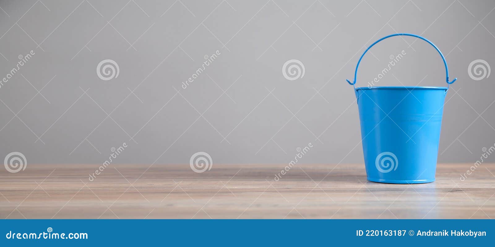 Blue Bucket on the Desk. Space for Your Text Stock Image - Image of ...