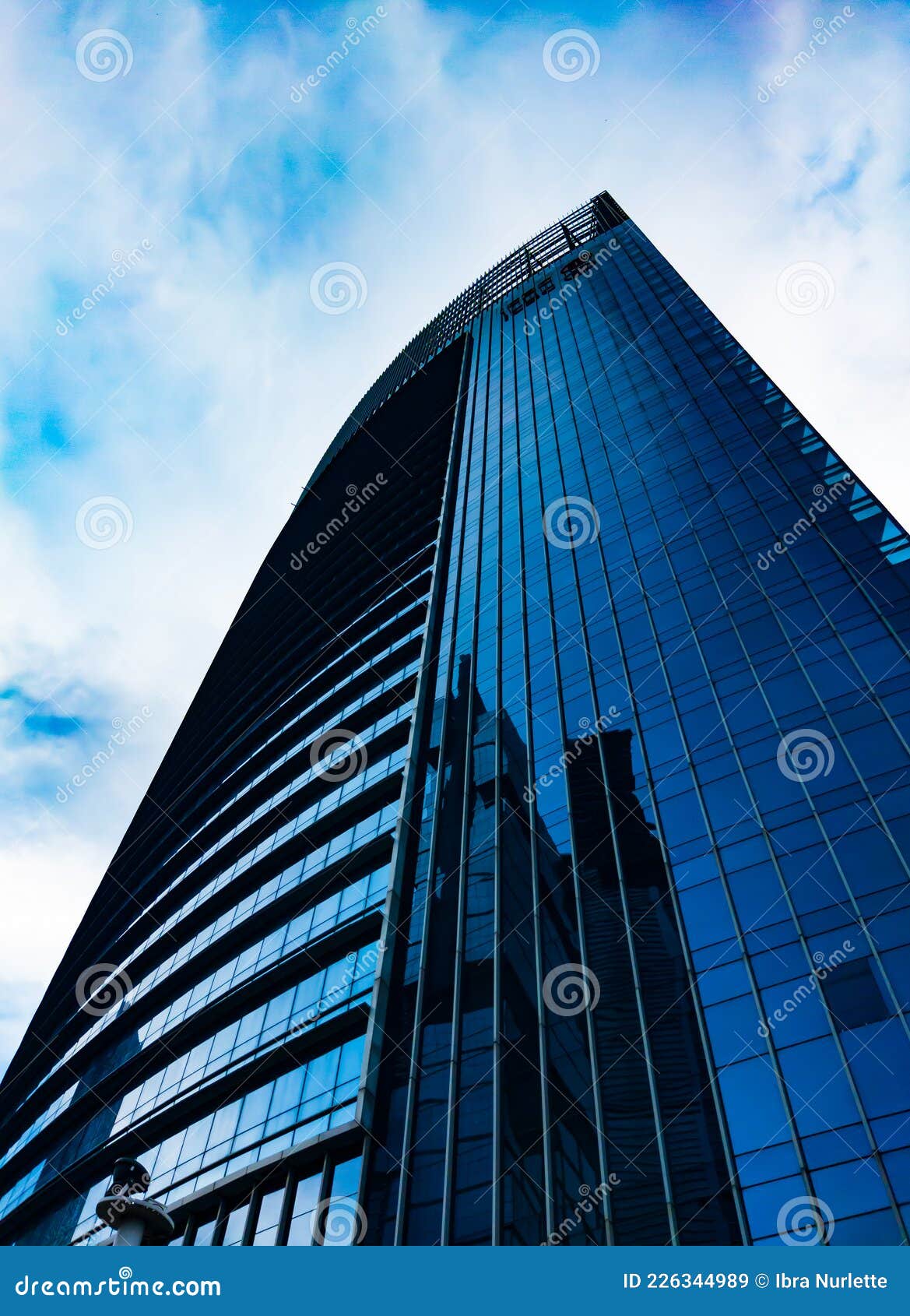 Blue Building Under Clear Sky. Stock Image - Image of buildding ...