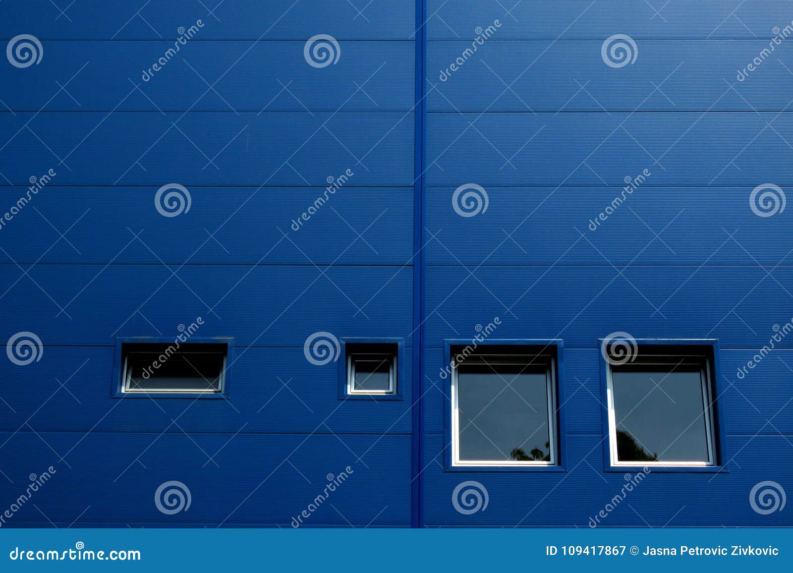 Blue building with windows stock image. Image of architecture - 109417867