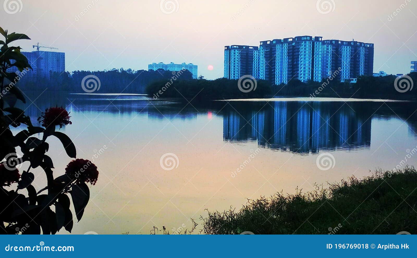 Sunset between Buildings with Reflection Stock Photo - Image of city ...