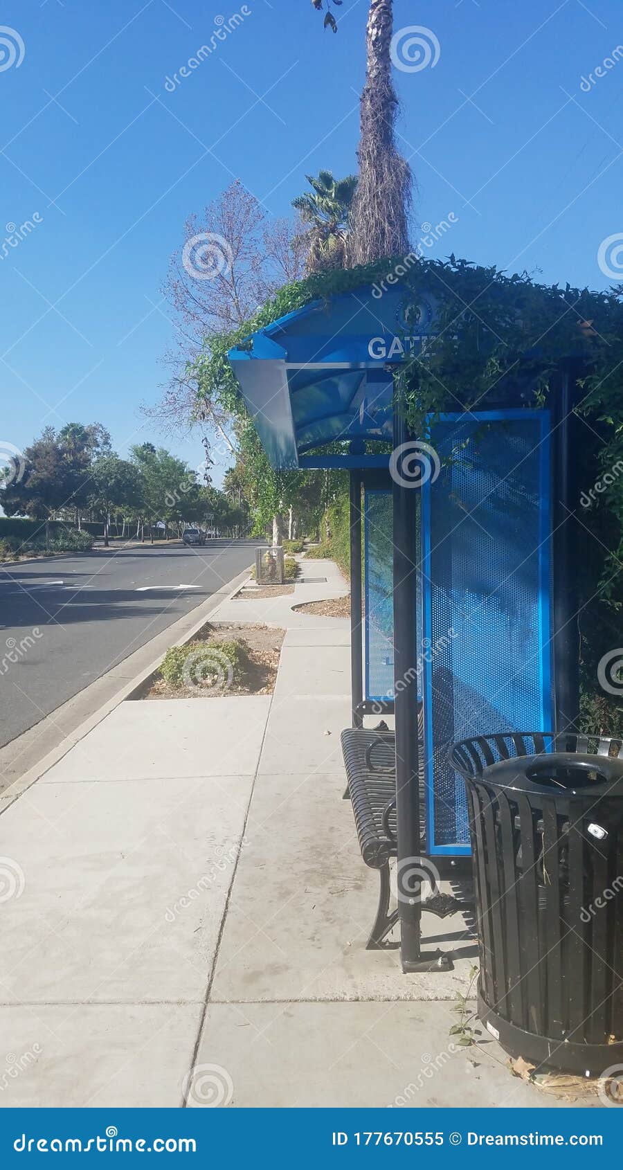 Blue Bus Stop stock image. Image of stop, sidewalk, trashbin - 177670555