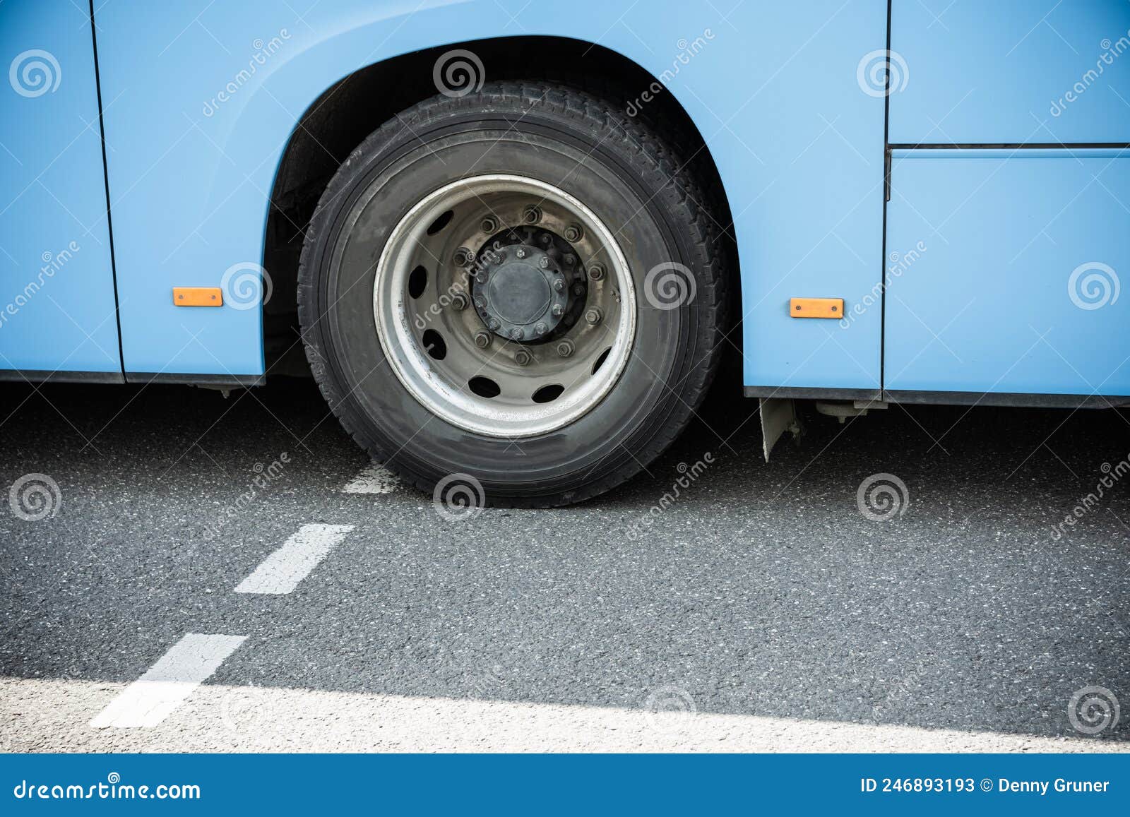 A Bus with a Wheel on a Road Stock Image - Image of vehicle, object ...