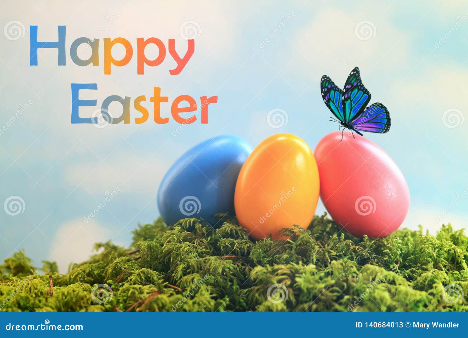 Blue Butterfly Sitting on Colorful Easter Eggs with the Words Happy ...