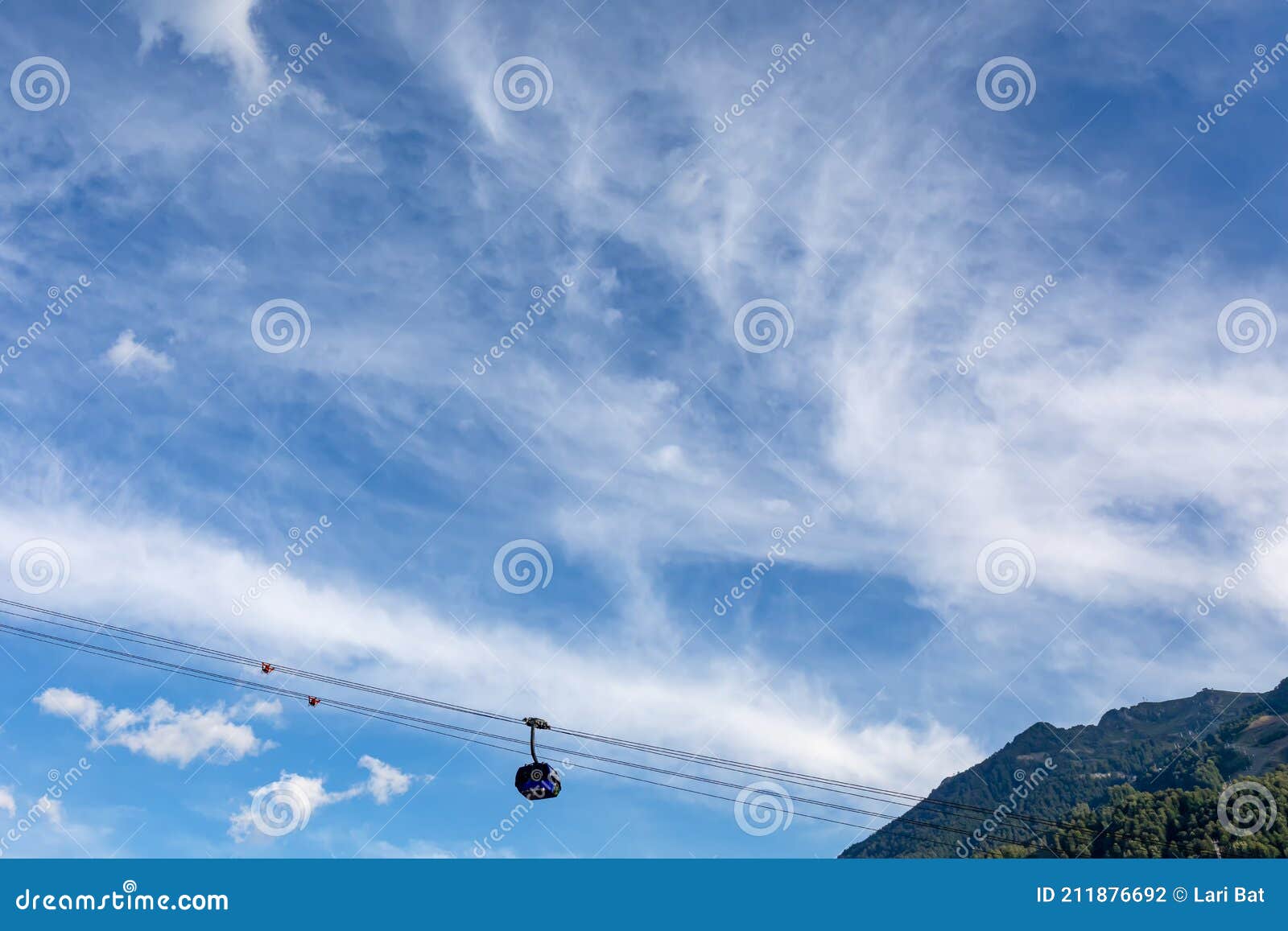 Blue Cable Car Above the Clouds Against the Sky Stock Photo - Image of ...