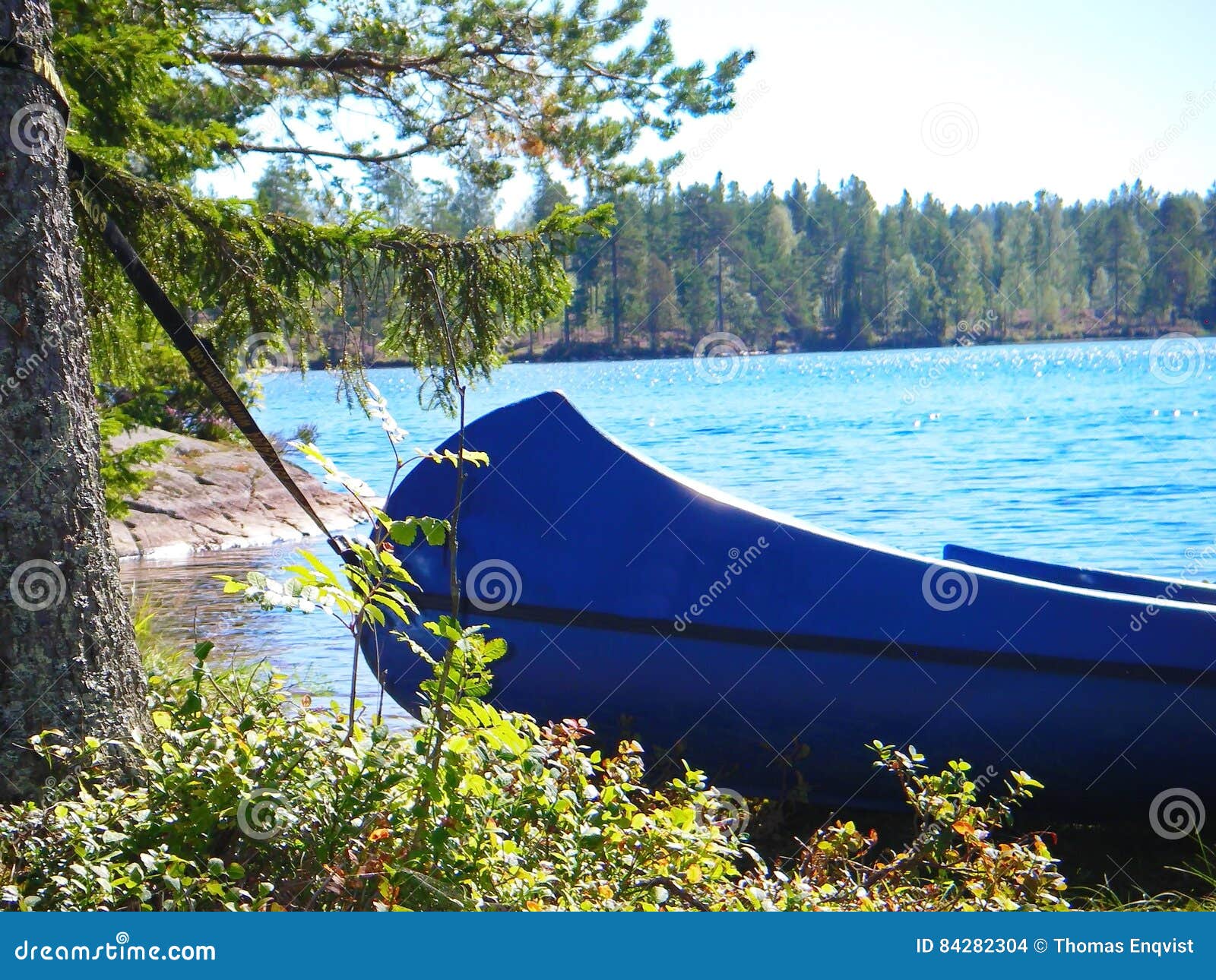 Blue canoe stock photo. Image of sweden, shore, vacation - 84282304