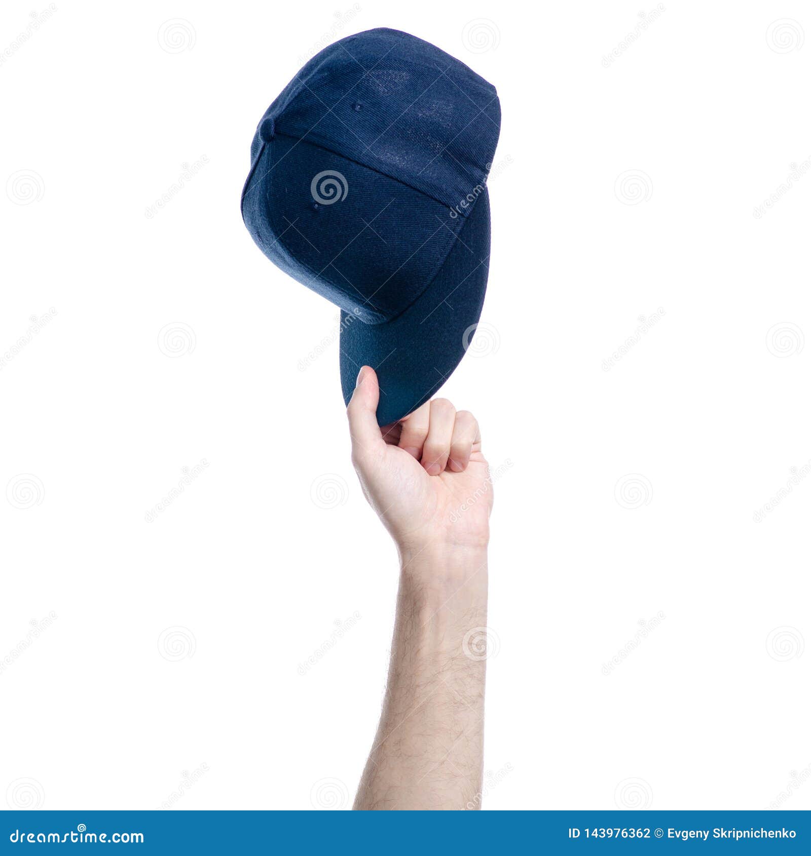 Blue cap in hand stock photo. Image of cotton, front - 143976362