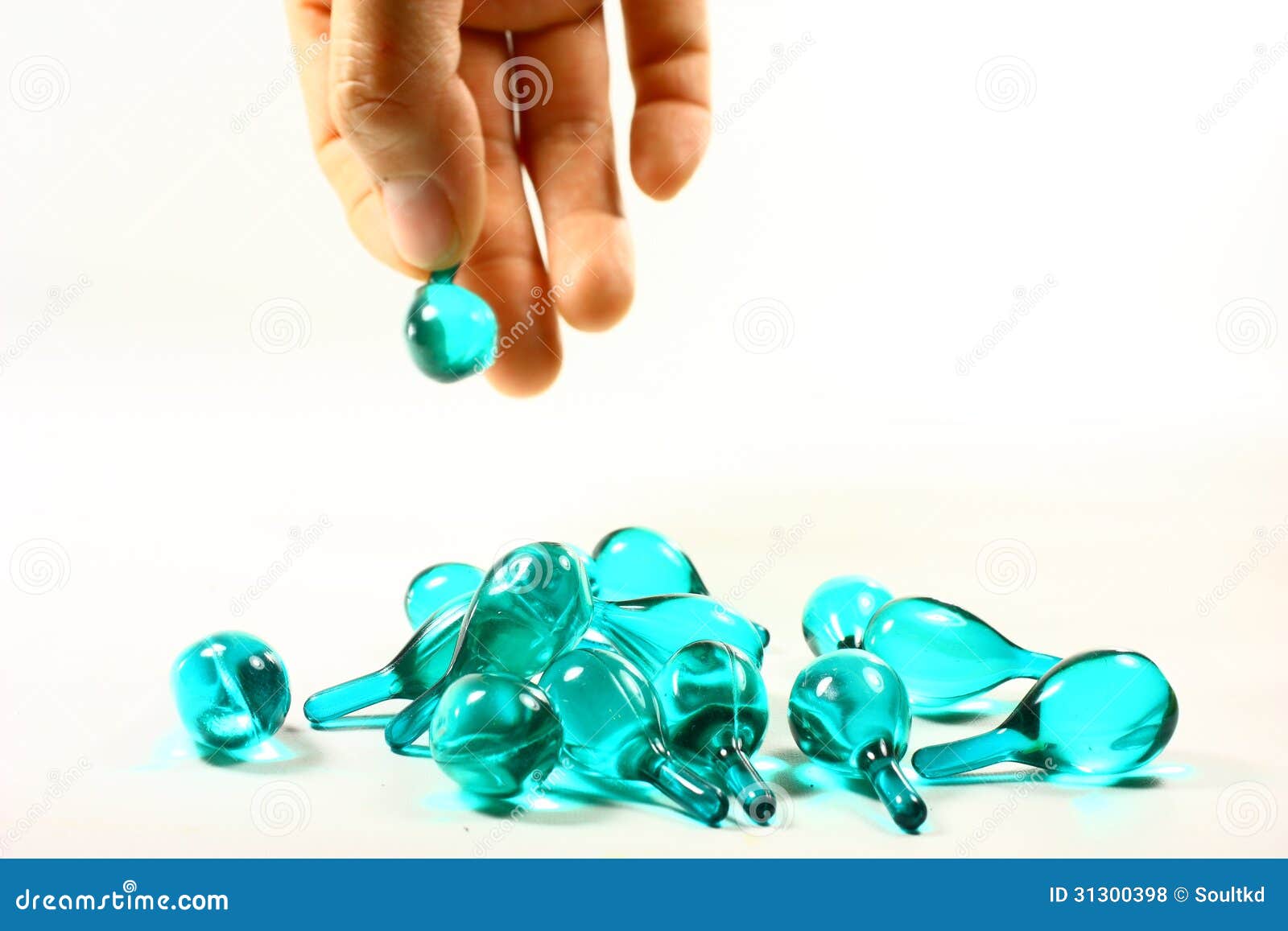 Blue Capsule and Hand in Isolate Stock Photo - Image of serum, science ...