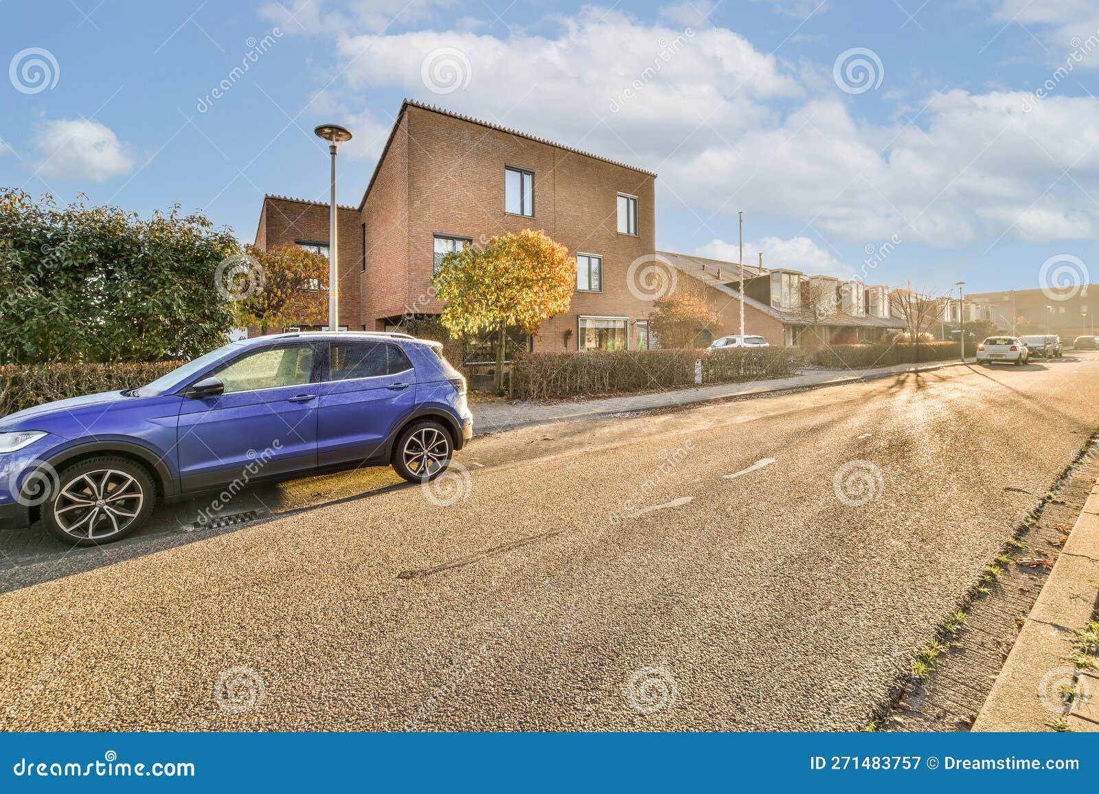 A Blue Car Parked on the Side of the Road Stock Image - Image of ...