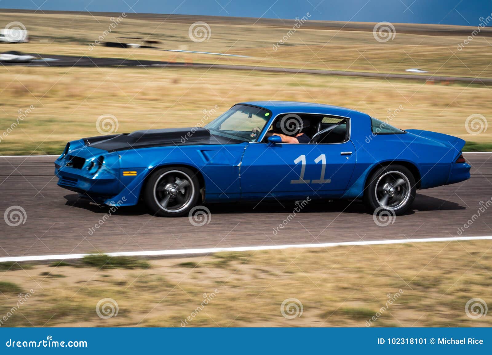 Blue car on race track editorial photo. Image of motorsport - 102318101