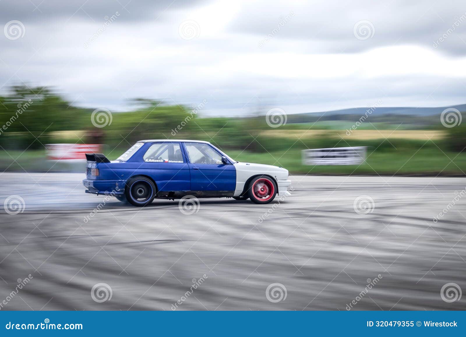 Blue Car Speeding through the Race Track Curves Stock Image - Image of ...