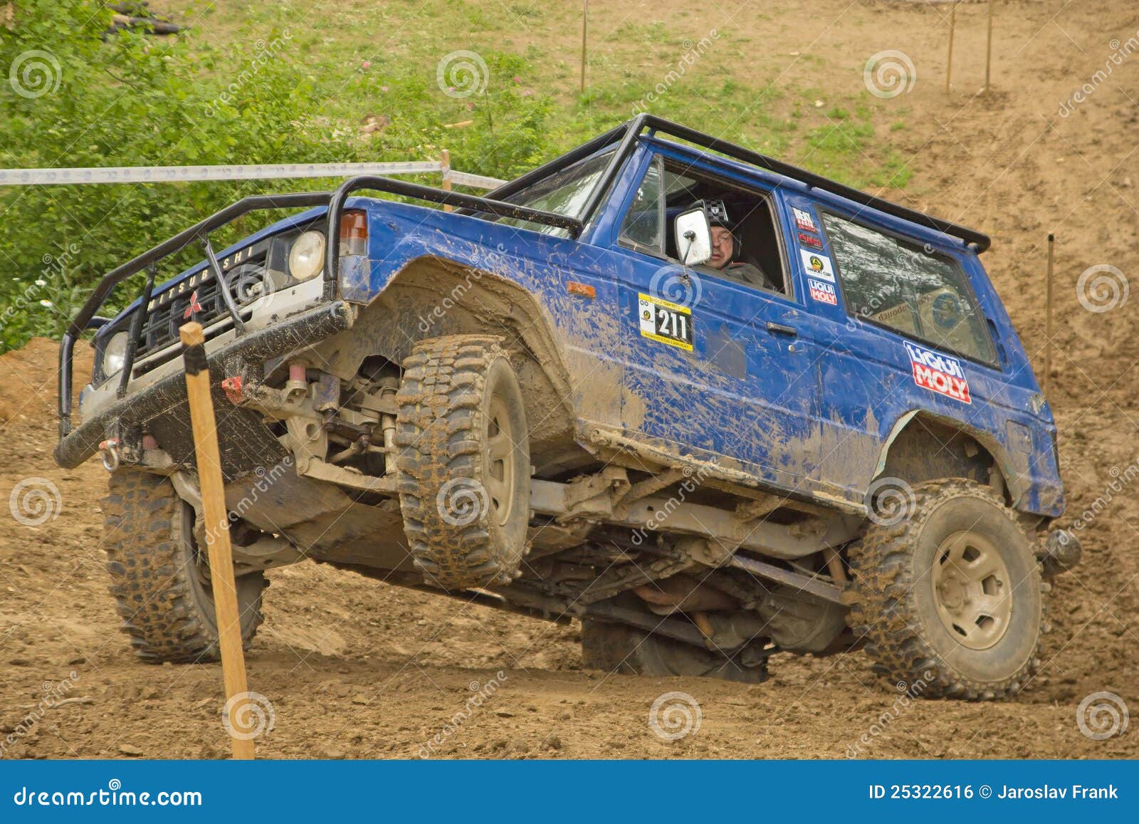 Blue Car on a Steep Slope in the Terrain Editorial Photo - Image of ...