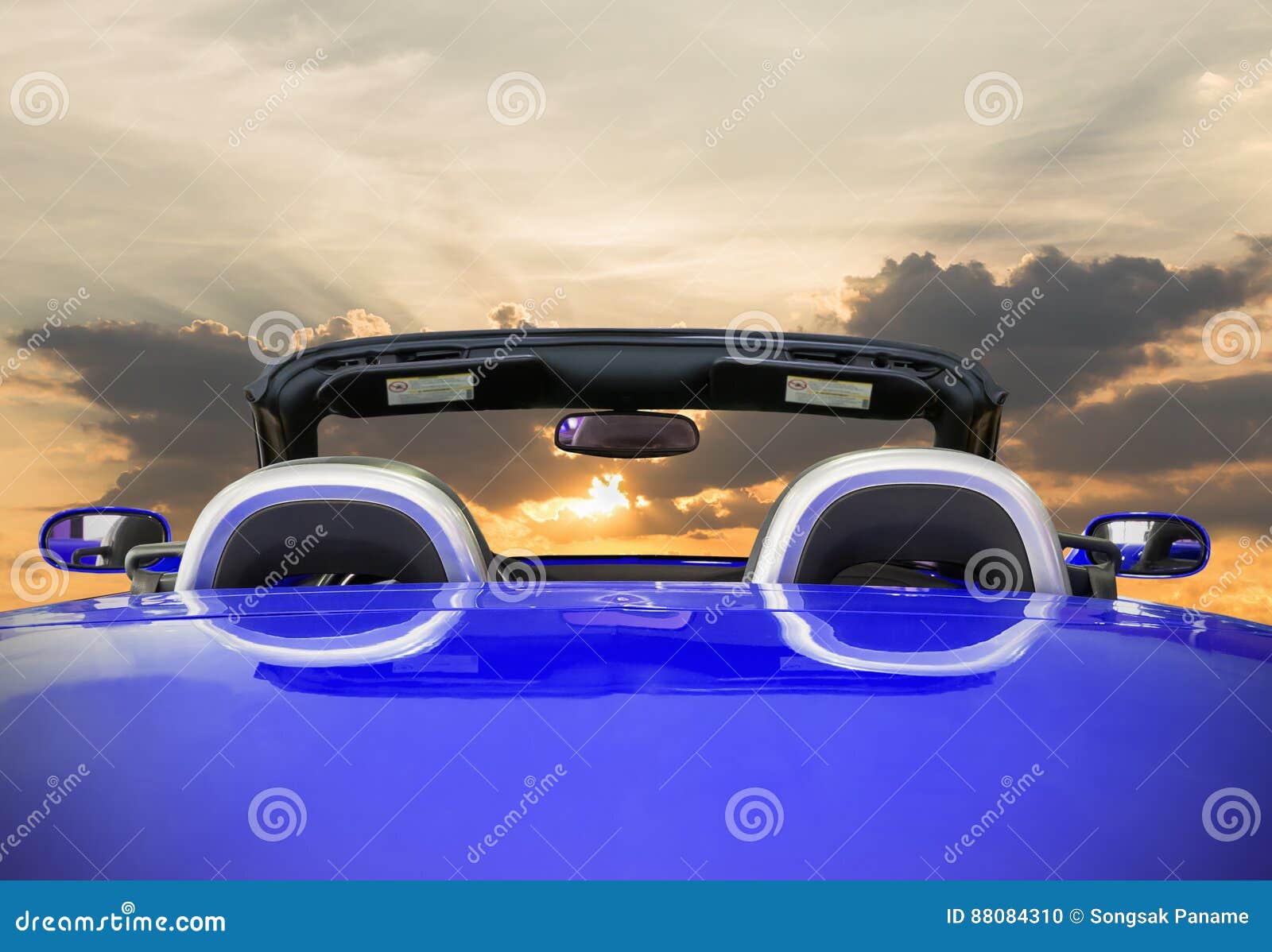 The blue car with sunset stock photo. Image of panel - 88084310