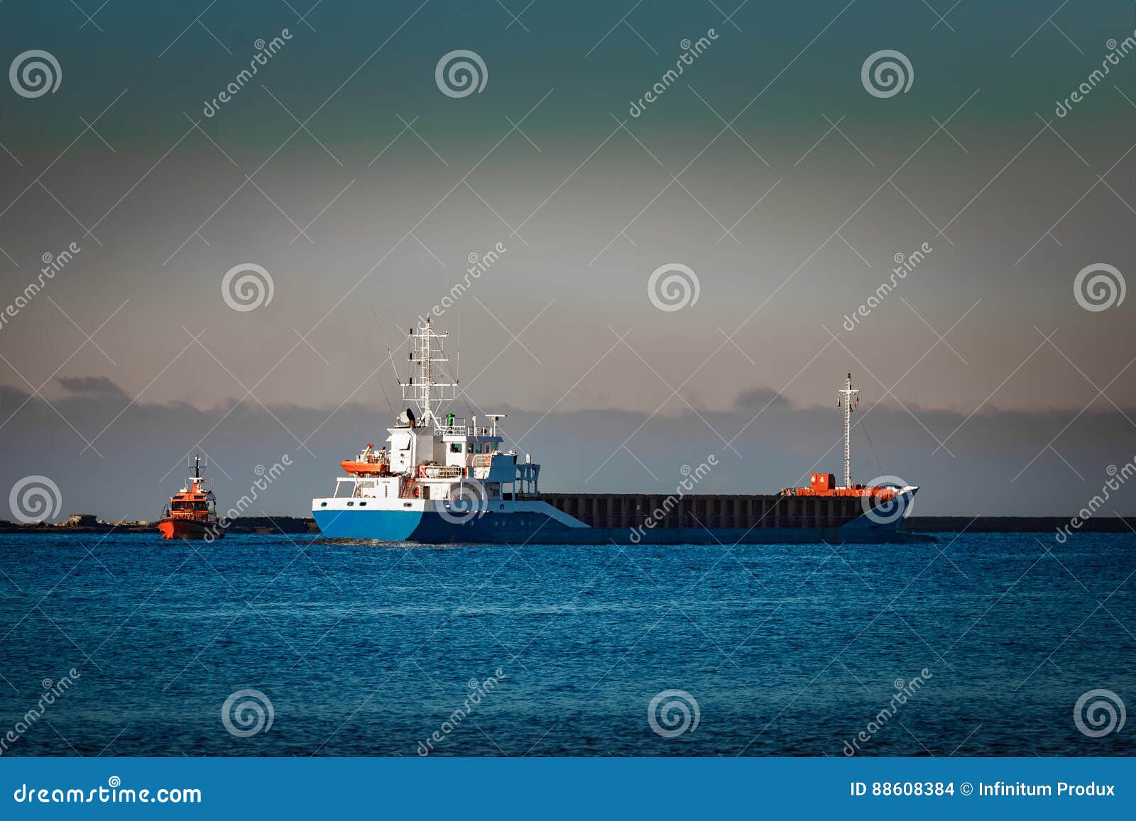 Blue cargo ship stock photo. Image of moving, large, ocean - 88608384