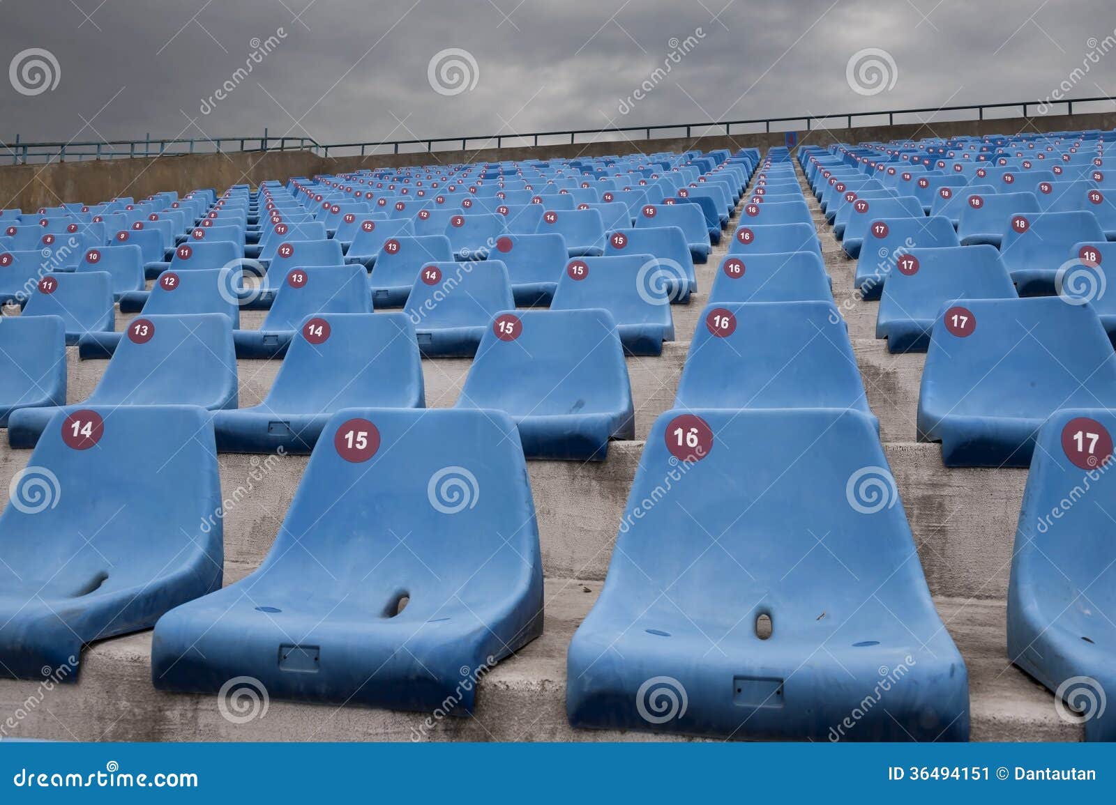 Blue chairs on a stadium stock image. Image of elements - 36494151
