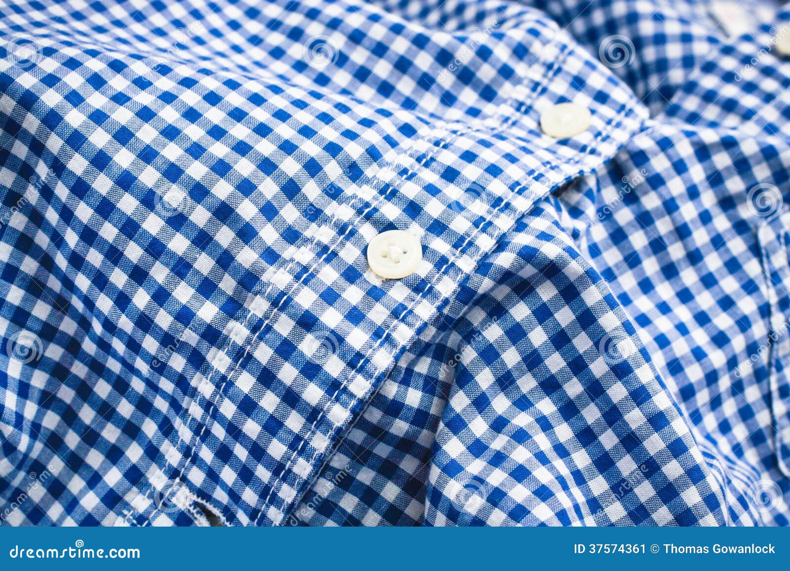 Blue checked shirt stock image. Image of button, label - 37574361
