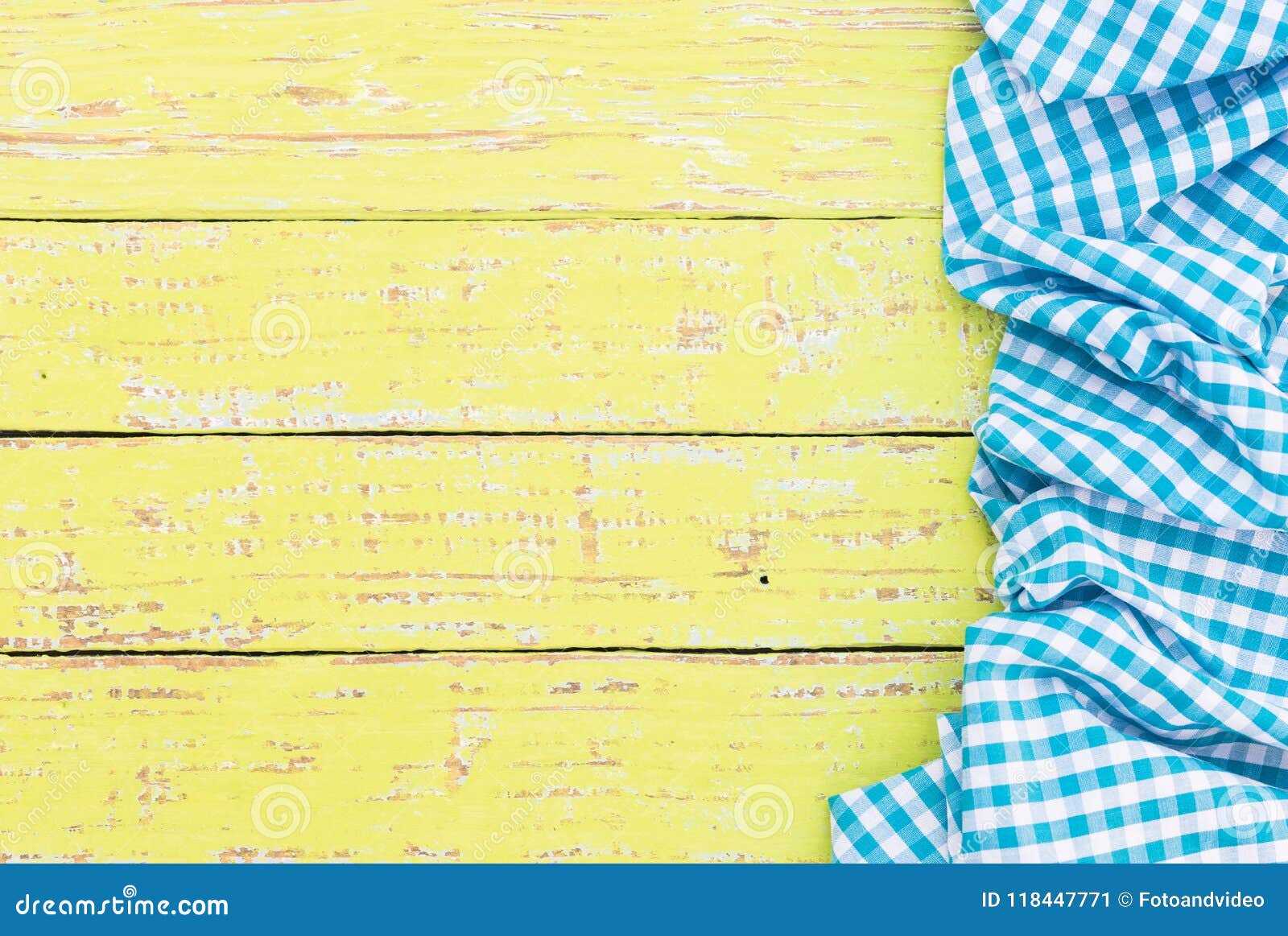 Blue Checked Tablecloth on the Right Side of Rustic Wooden Table ...
