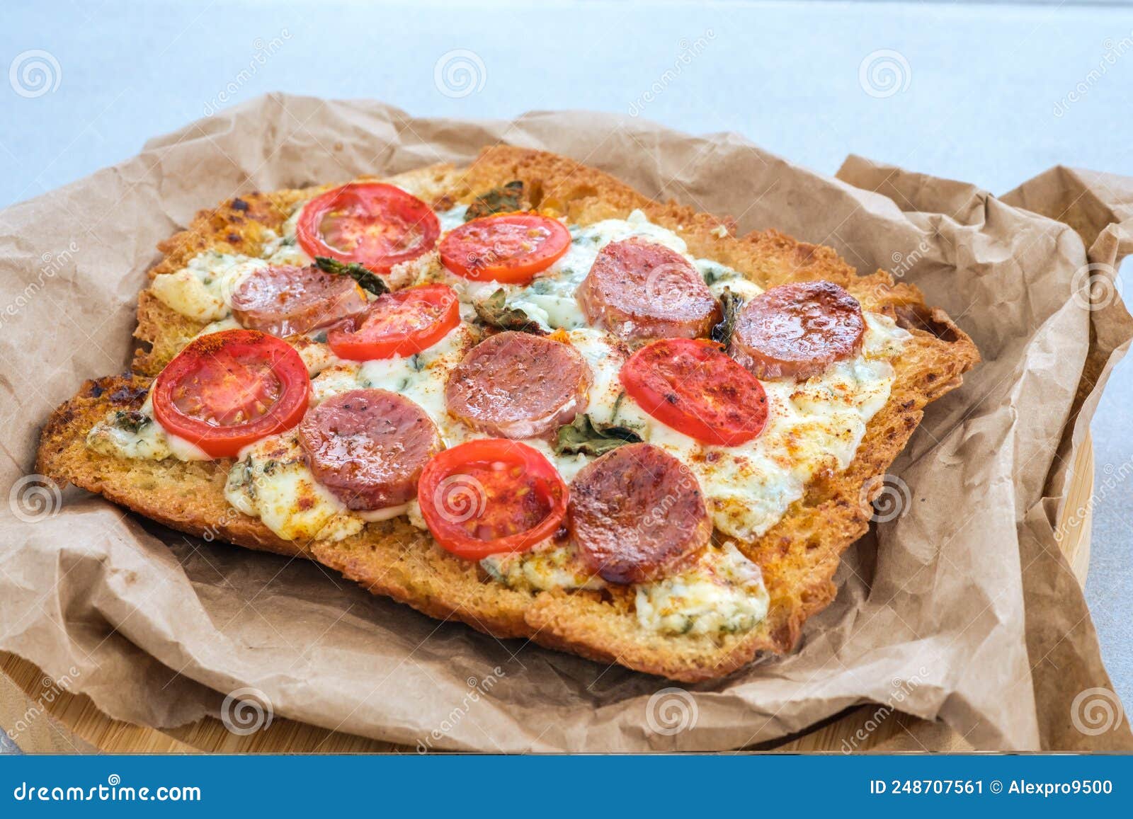 Blue cheese coca with fuet stock image. Image of paper - 248707561