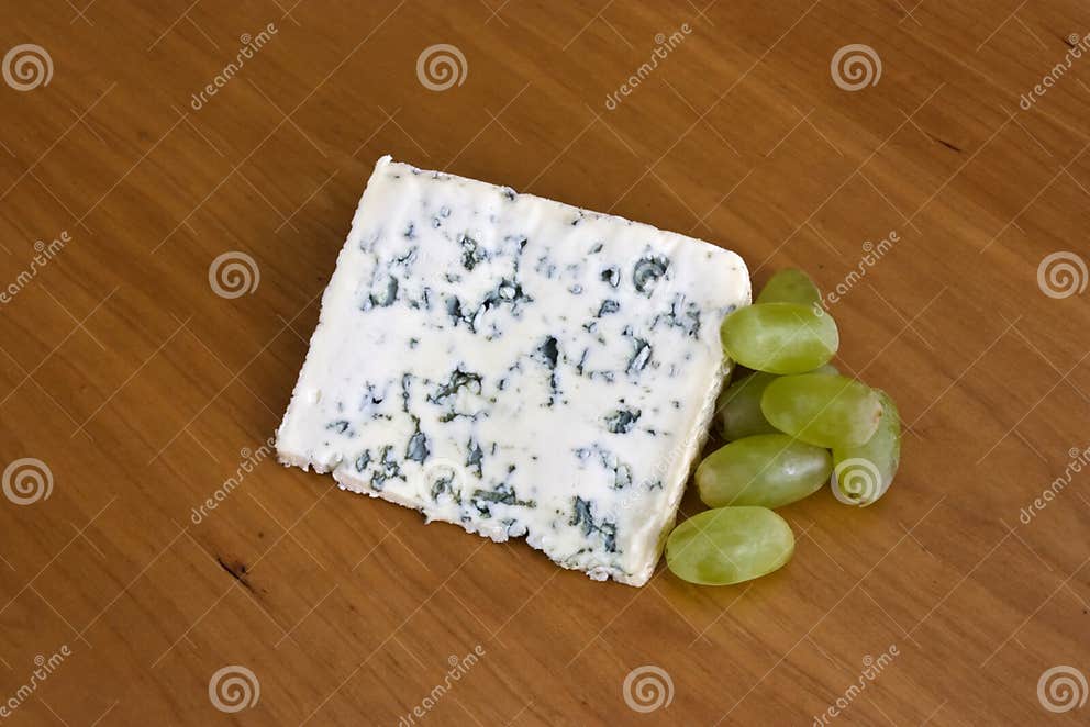 Blue Cheese and Grapes on a Wood Board. Stock Photo - Image of dairy ...